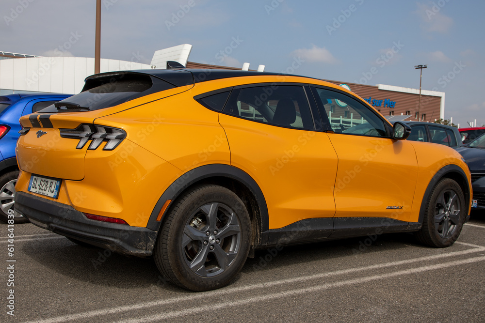 Ford Mustang Mach-E yellow ev electric american car Stock Photo | Adobe ...
