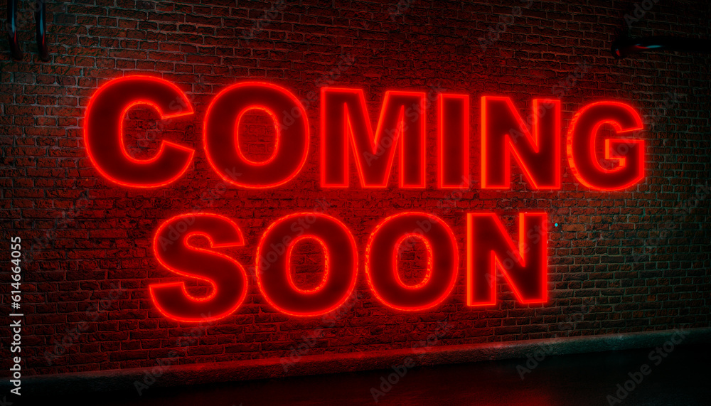 Coming soon, red neon sign. Brick wall at night with the text "Coming ...