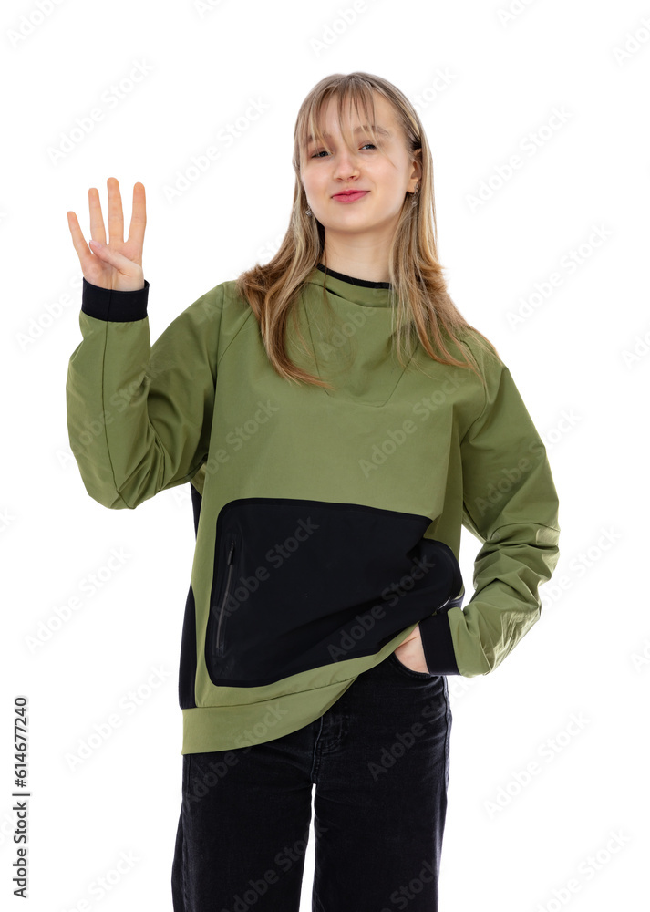 Portrait of fourteen year old teenager showing and pointing up with ...