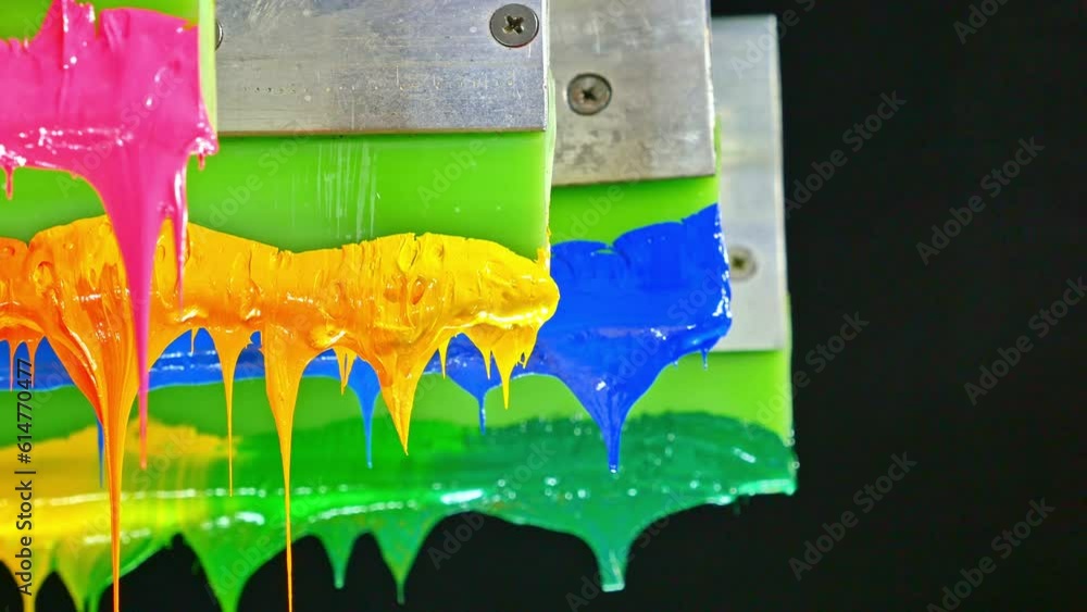 Video „Colorful plastisol ink sticks are stretched on the printer ...