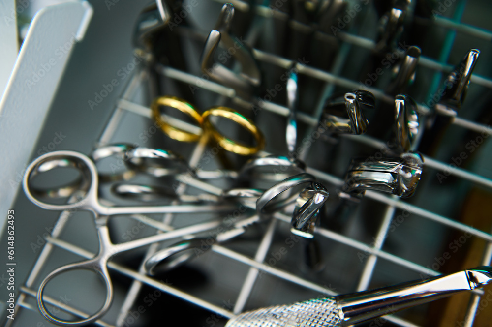 Selective focus on professional stainless steel dental tools sterilized ...