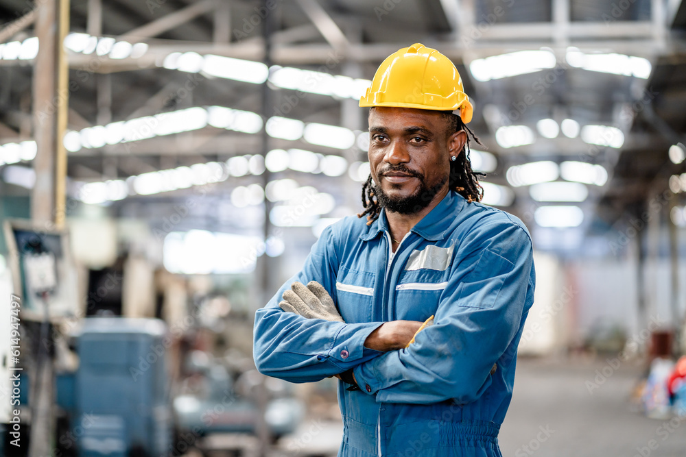 Portrait of view African American male worker smiling in a safety ...