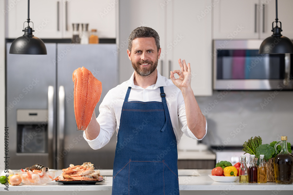 chef man cooking fish salmon, ok. chef man cooking fish in the kitchen ...