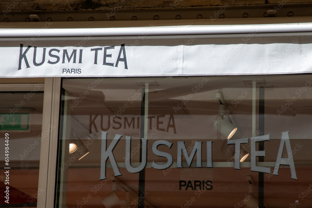 Kusmi Tea paris chain food logo sign and brand text store wall facade ...