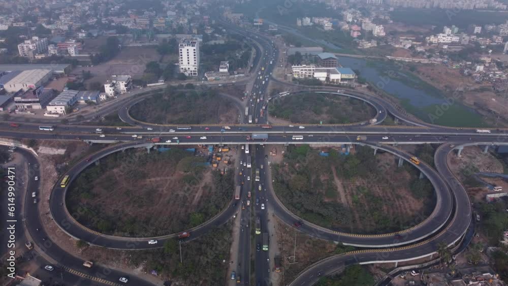 Aerial view of the Iconic cloverleaf interchange of Maduravoyal flyover ...