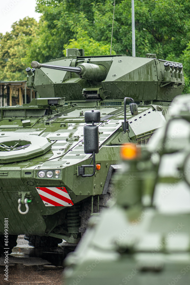 Armoured tanks and military infantry fighting vehicles ready to move ...