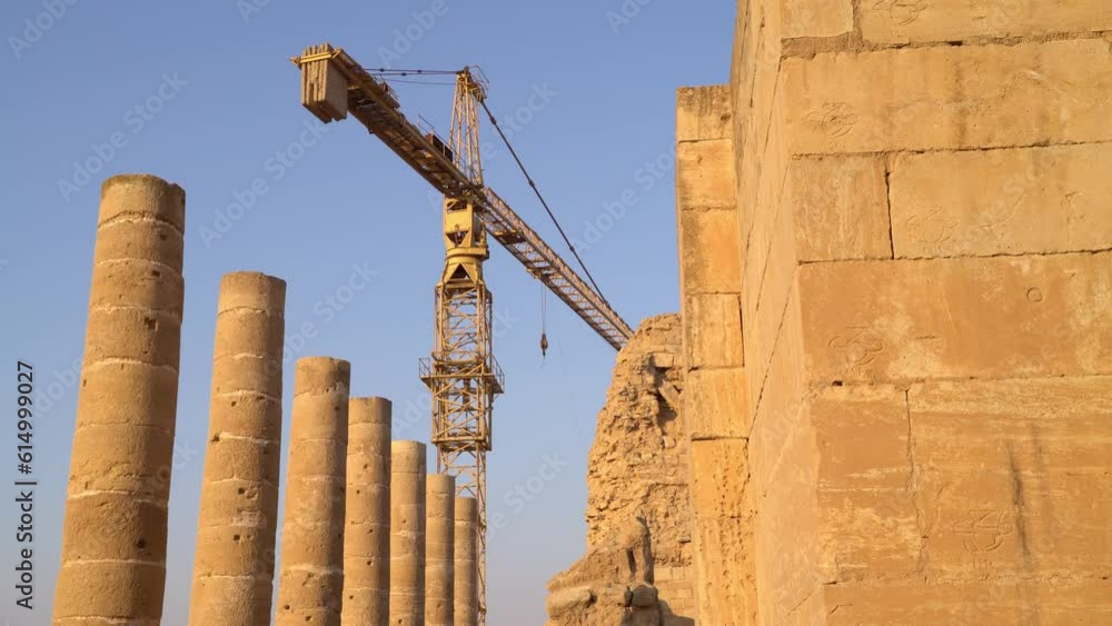 Reconstruction of Hatra Ruins in Iraq, Crane Next to Ancient Monument ...