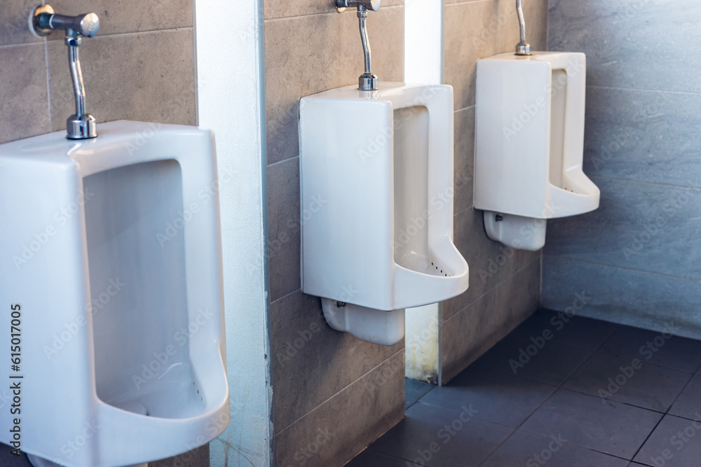 Toilet men's room. Row of outdoor urinals men public toilet, Closeup ...