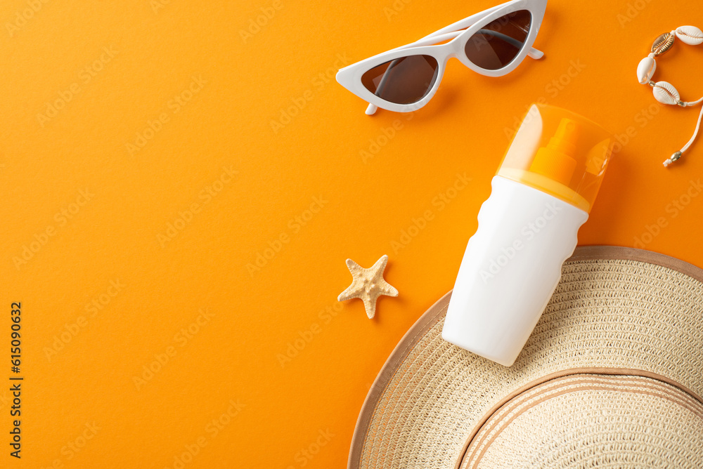 Ultraviolet Safety Month concept. Above view photo of straw hat, shells ...