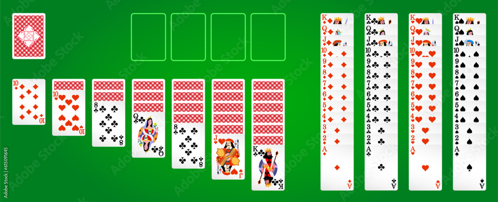 Playing solitaire game on green background with standard playing cards ...