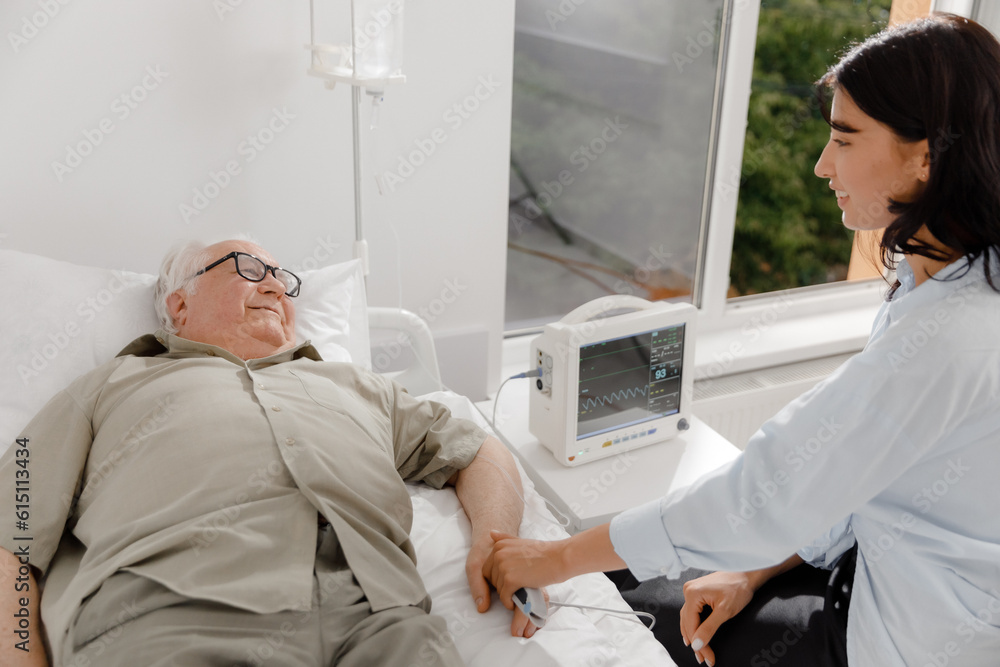 Modern hospital old man patient have a health checkup he wearing finger ...
