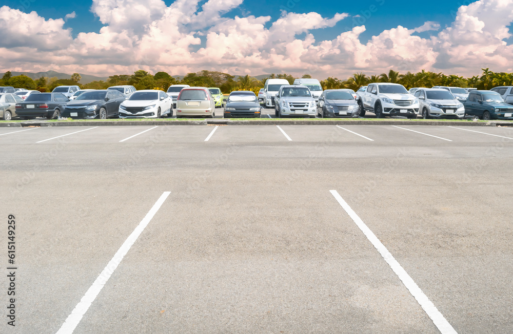 Wide empty asphalt parking lot background. with many cars parked ...