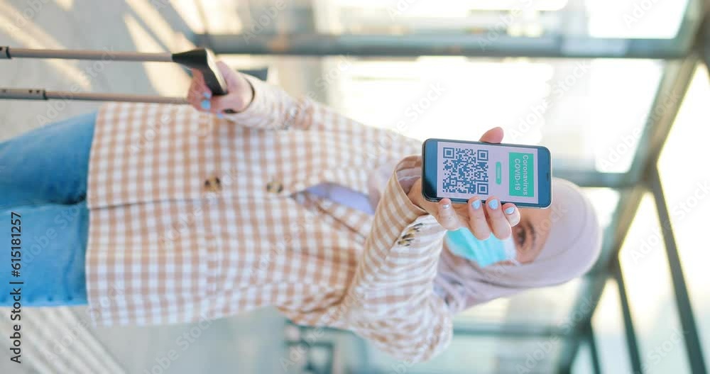 Vertical shot oriental on Arabic woman with covered head hijab holding ...