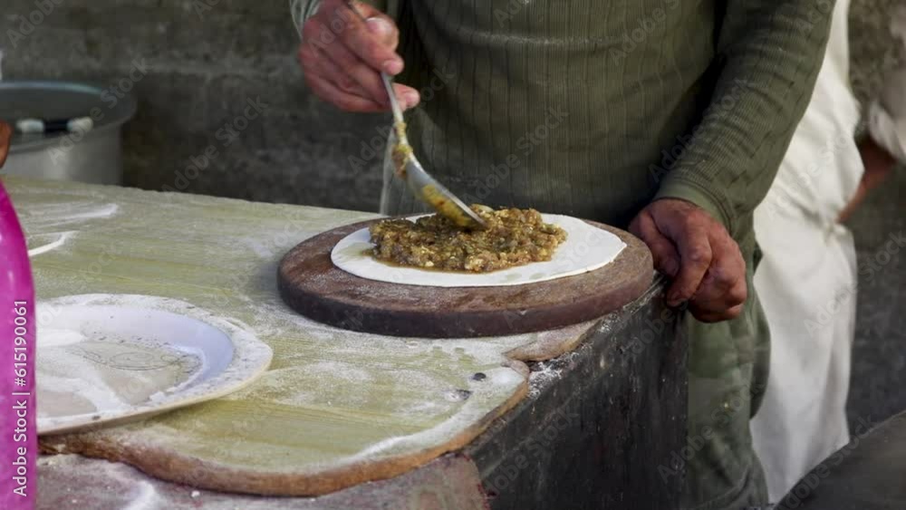 Making of Chapshoro a traditional dish of Hunza Pakistan. Handheld ...