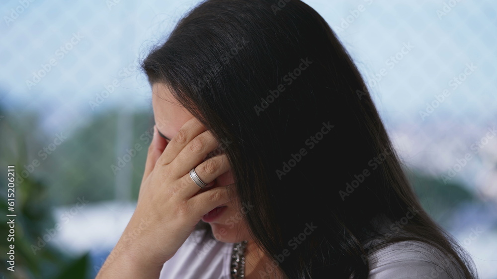 Remorseful Expression of a Diverse Asian Young Woman Covering Her Face ...