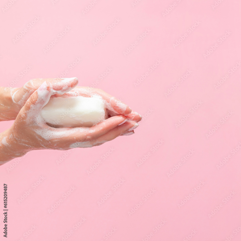 Washing of hands with soap. Cleaning hands. Closeup on woman hands with ...