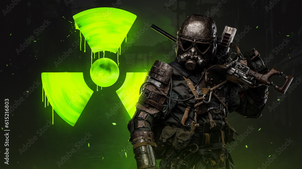 Soldier stands against a massive green nuclear protection sign ...