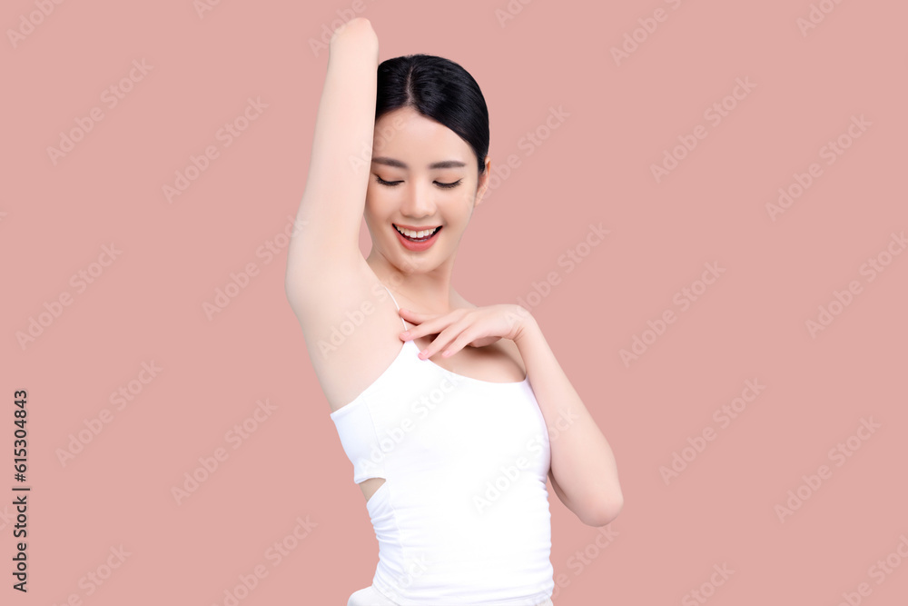 Poster Beautiful young Asian girl lifting hand up to shows off clean and clear armpit or ...
