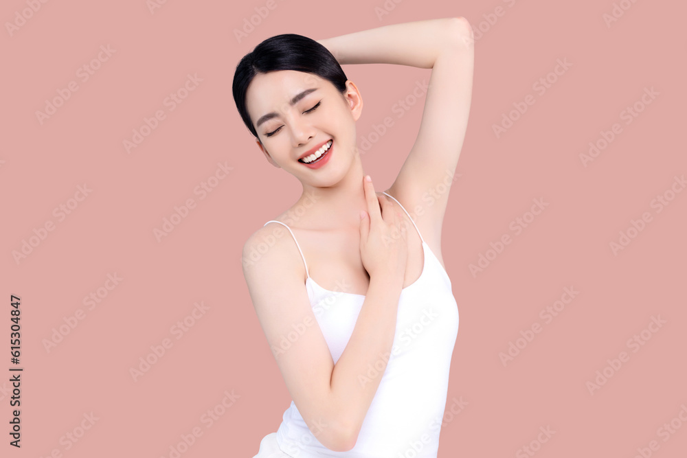 Beautiful young Asian girl lifting hand up to shows off clean and clear ...