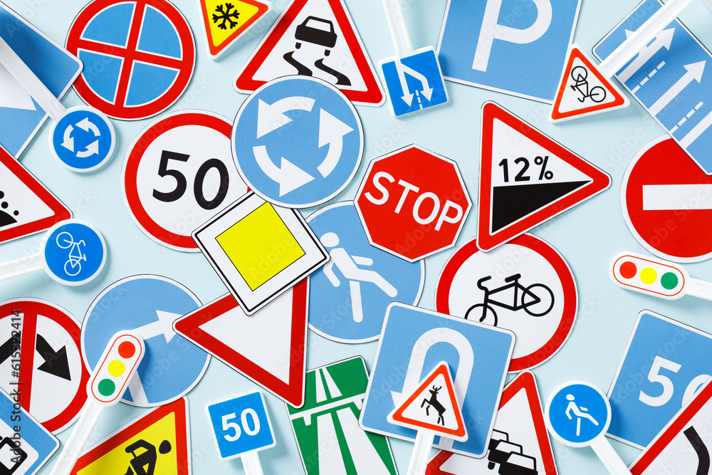 Pattern of different road signs on the table. Flat lay, top view. Stock ...