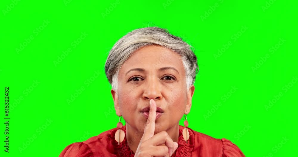 Secret, green screen and senior woman in a studio with a quiet or ...