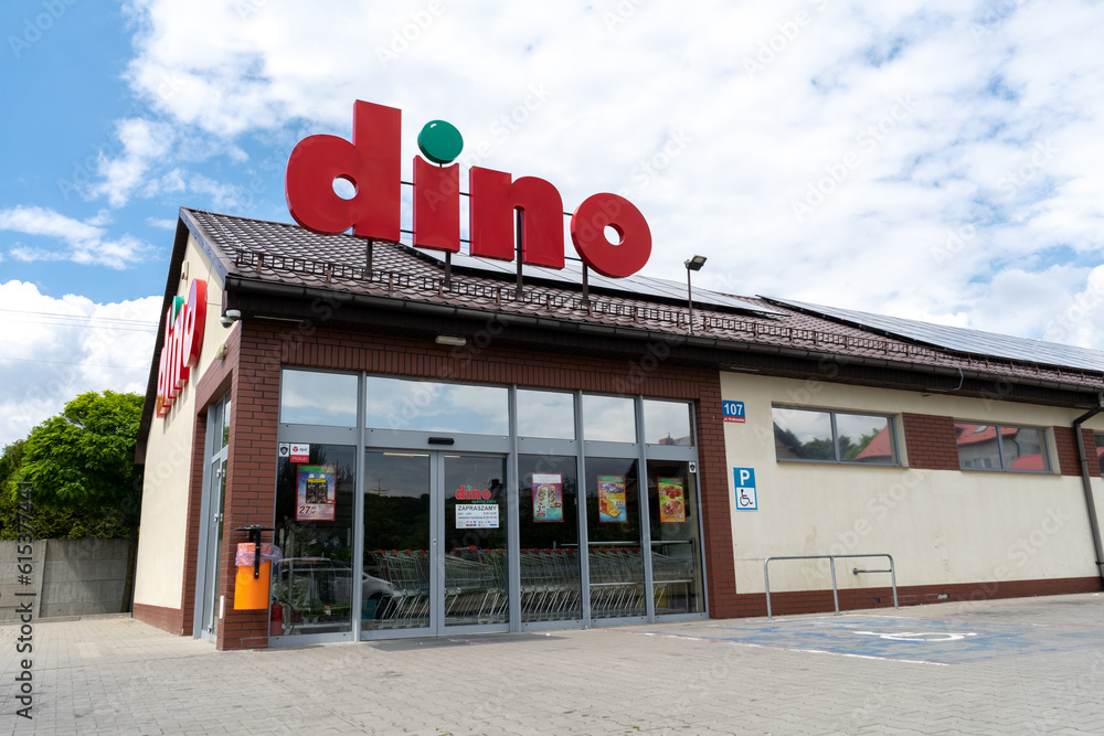 Foto de Dino supermarket shop with logo sign. Polish retail chain ...