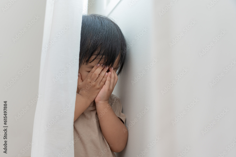 little asian children kid girl covering his eyes with hands, playing ...