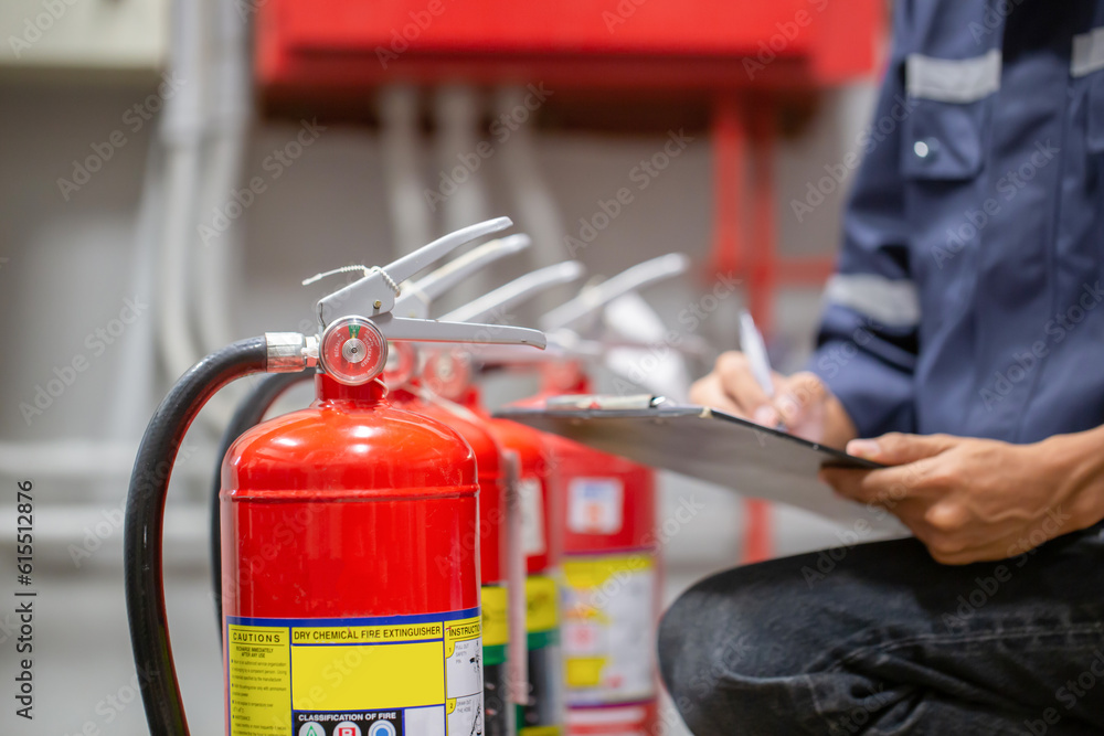 Engineer are checking and inspection a fire extinguishers tank in the ...