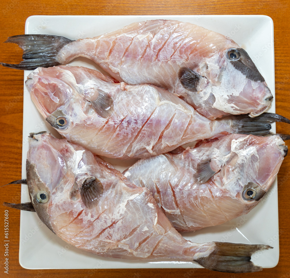 Clean and seasoned Peroá fish (Balistes capriscus) . Typical fish from ...