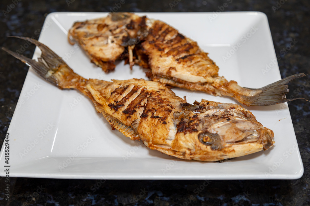 Clean and seasoned Peroá fish (Balistes capriscus) . Typical fish from ...