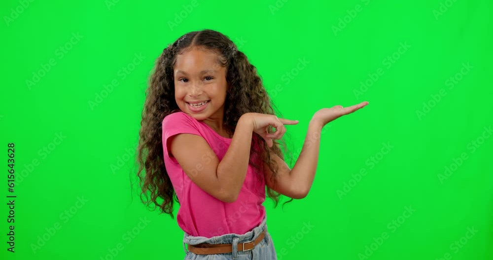 Green screen, face and girl pointing, palm and showing against a studio background. Portrait ...