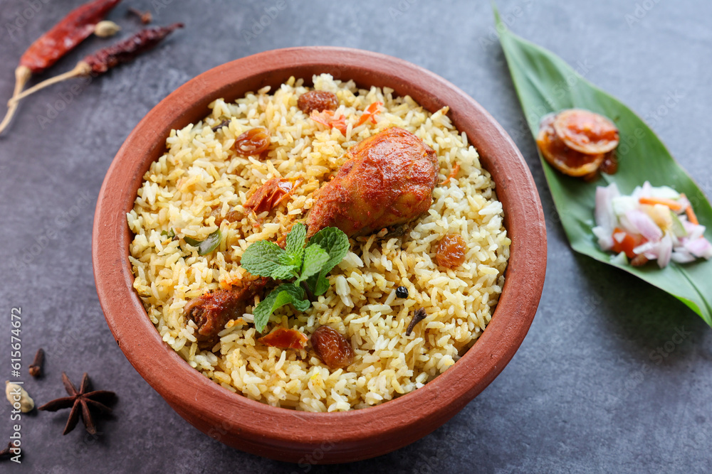 Chicken biryani Spicy Indian Malabar biryani Hyderabadi biryani, Dum ...