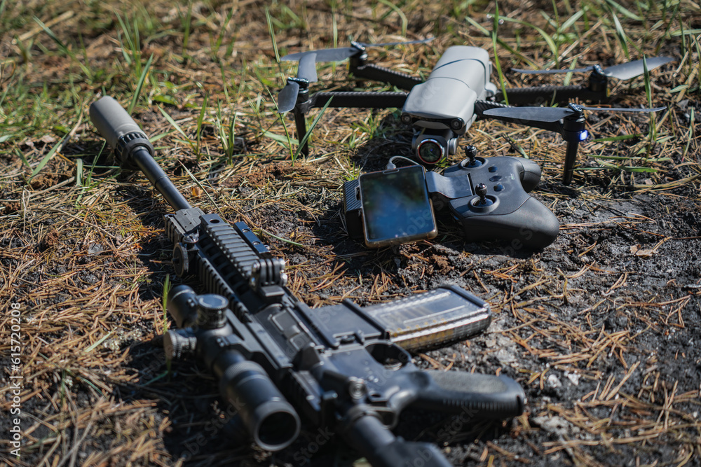 Drone with camera and remote control and assault weapon with silencer ...