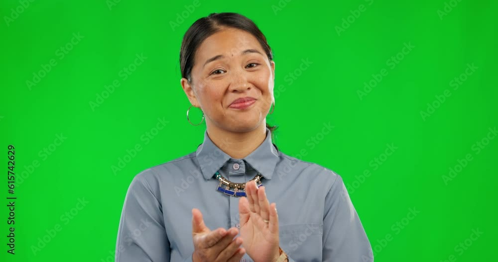 Asian woman, applause and thumbs up for success on green screen in ...