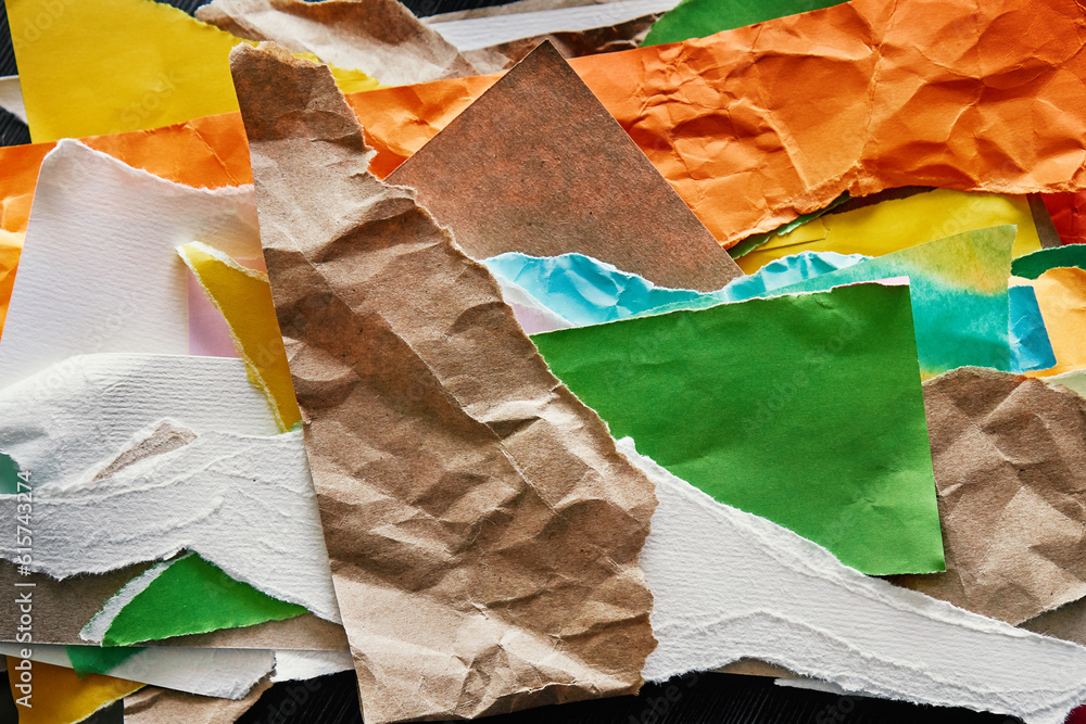 Abstract photo composition made from colorful pieces of torn crumpled ...