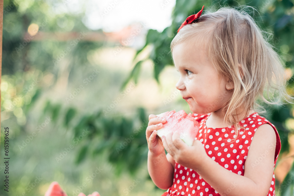 Cute child eats ripe juicy watermelon at summertime. Child, baby ...