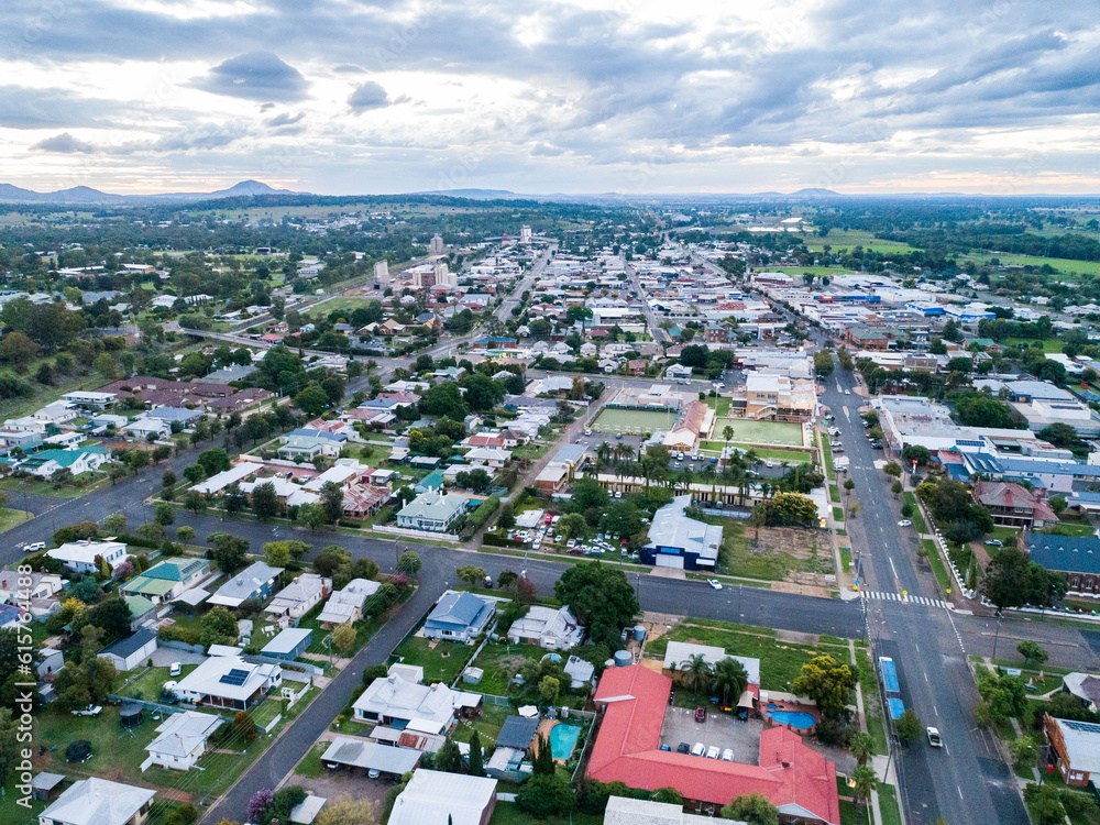 Streets and houses of the country town of Gunnedah on overcast evening ...