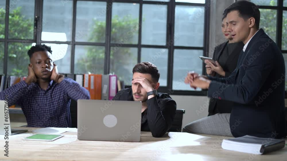 group of disappointed multi-ethnic business people meeting with laptop ...