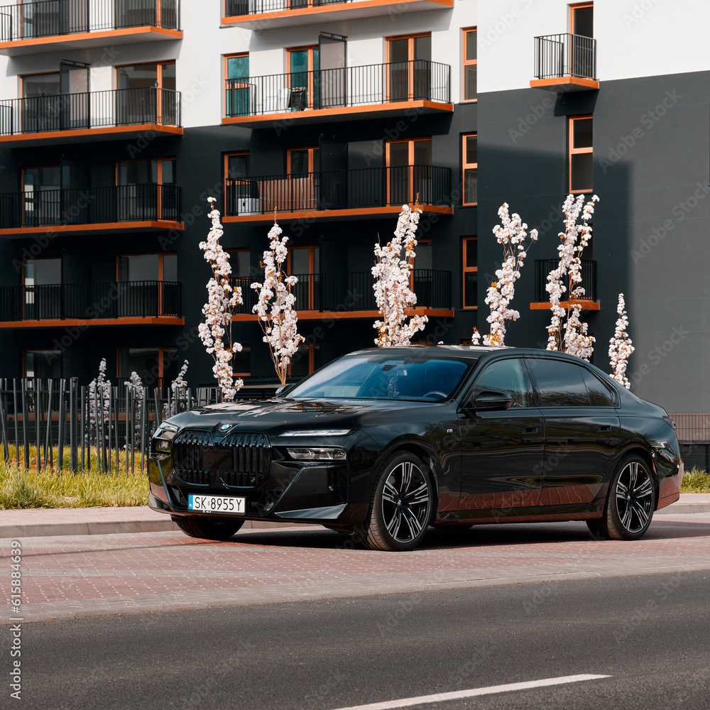 BMW 7 Series, G70, a modern premium limousine. A car on the background ...