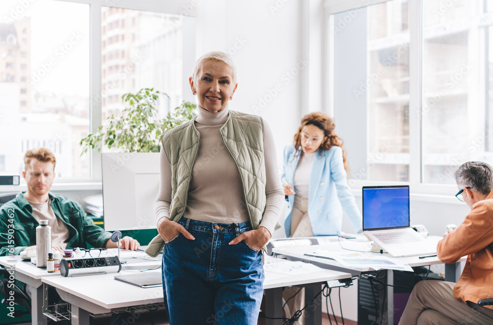 Half length portrait of confident female entrepreneur 50 years old ...