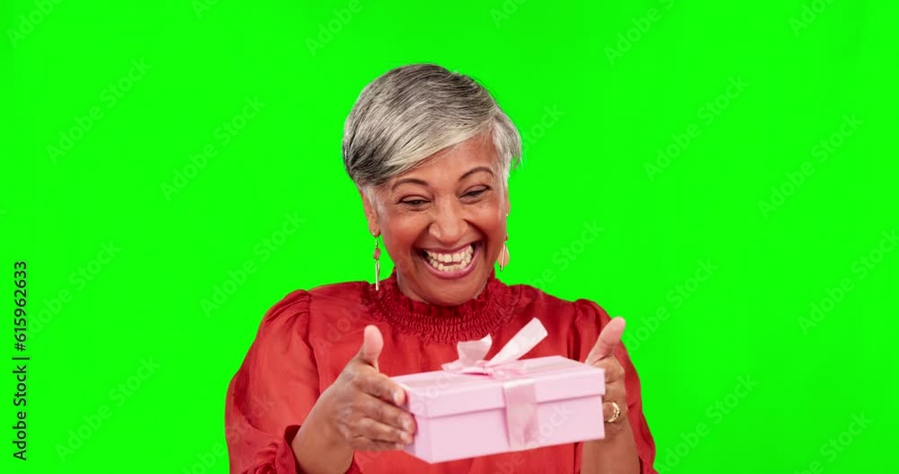 Gift, green screen and portrait of excited senior woman with a present ...