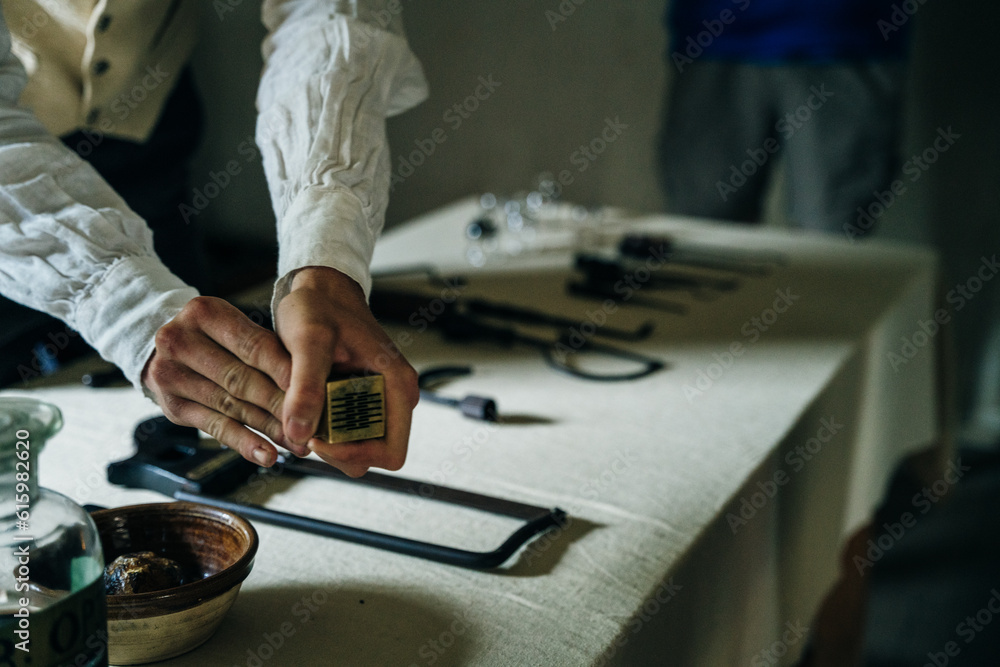 medieval medical tools, detail of vintage surgeon tools on a table ...