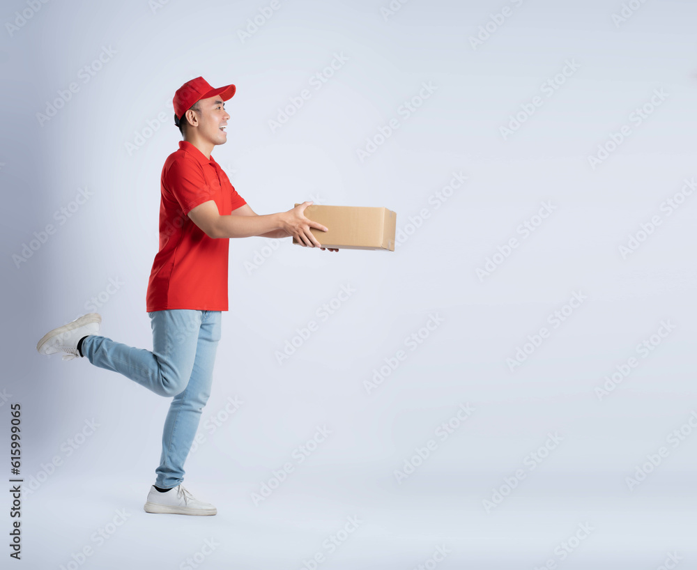 full body image of asian delivery man posing on white background Stock ...
