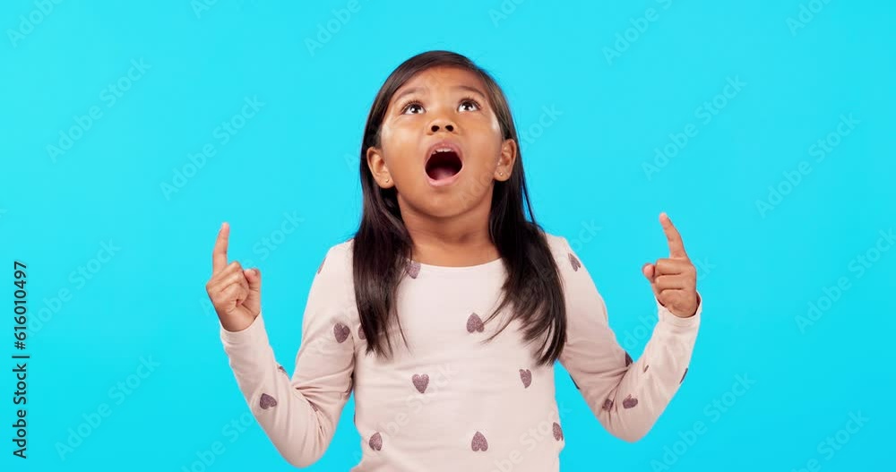 Vidéo Stock Pointing up, hands and wow by girl child in studio with ...