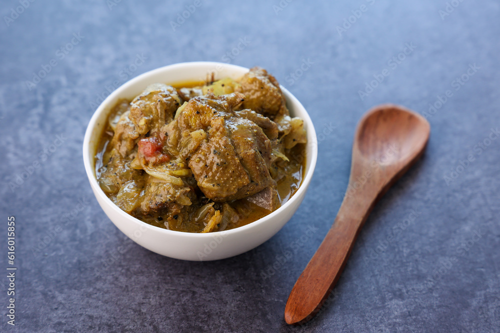 A traditional duck curry roast. Kerala style duck or chicken curry with ...