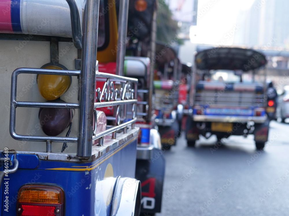 Typical Tuk-tuks in the traffic in Bangkok city Stock Photo | Adobe Stock