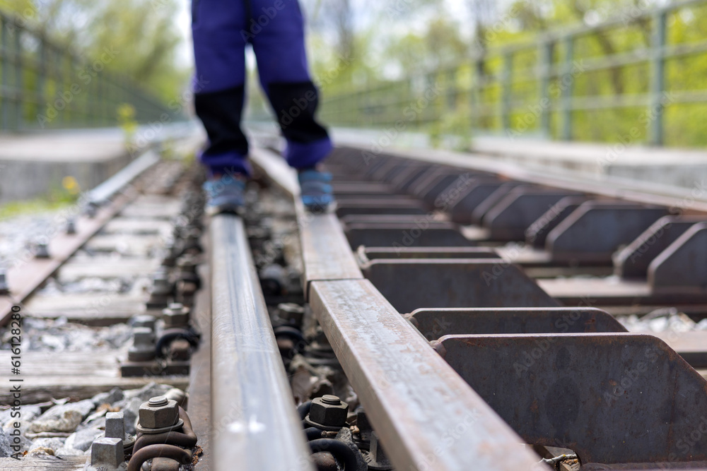 train railways and kid boy child legs stepping on close up Stock Photo ...