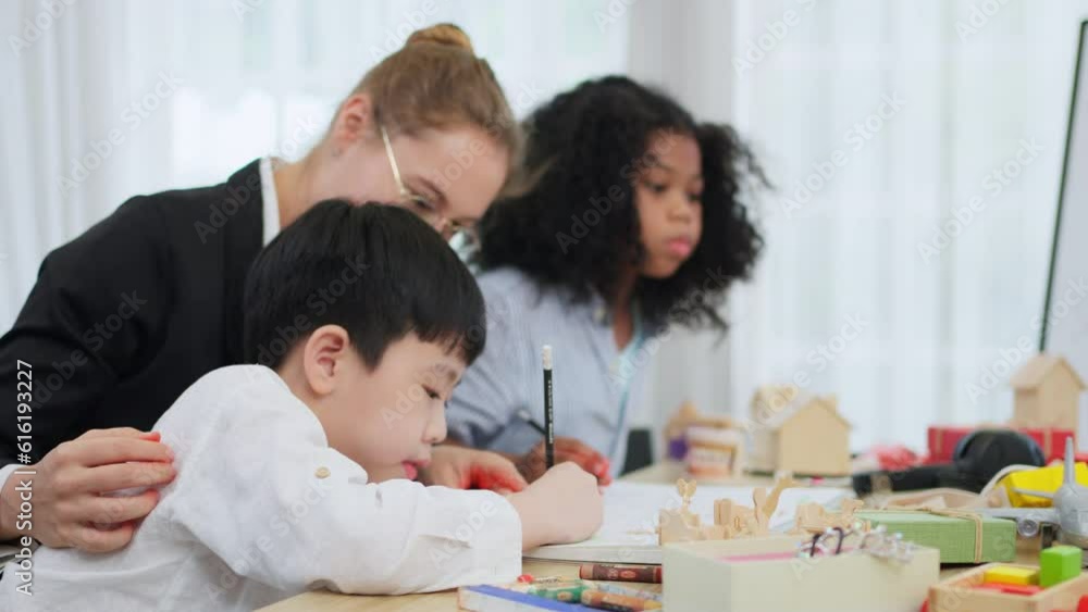 Teacher Inspiring Students with Vibrant Classroom Drawing. Teacher ...