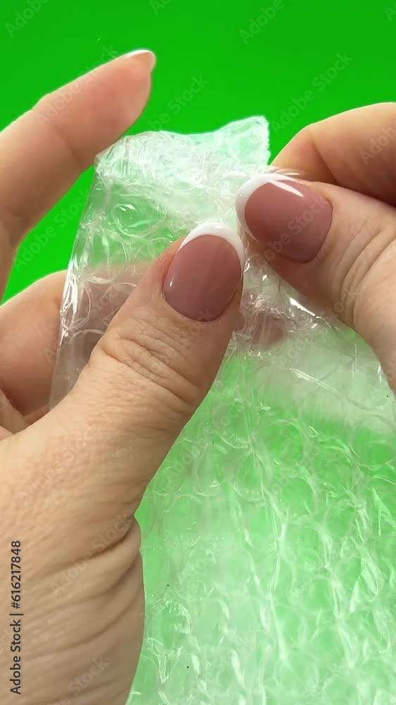 Relieve stress air bubble wrap hands of woman presses that burst ...