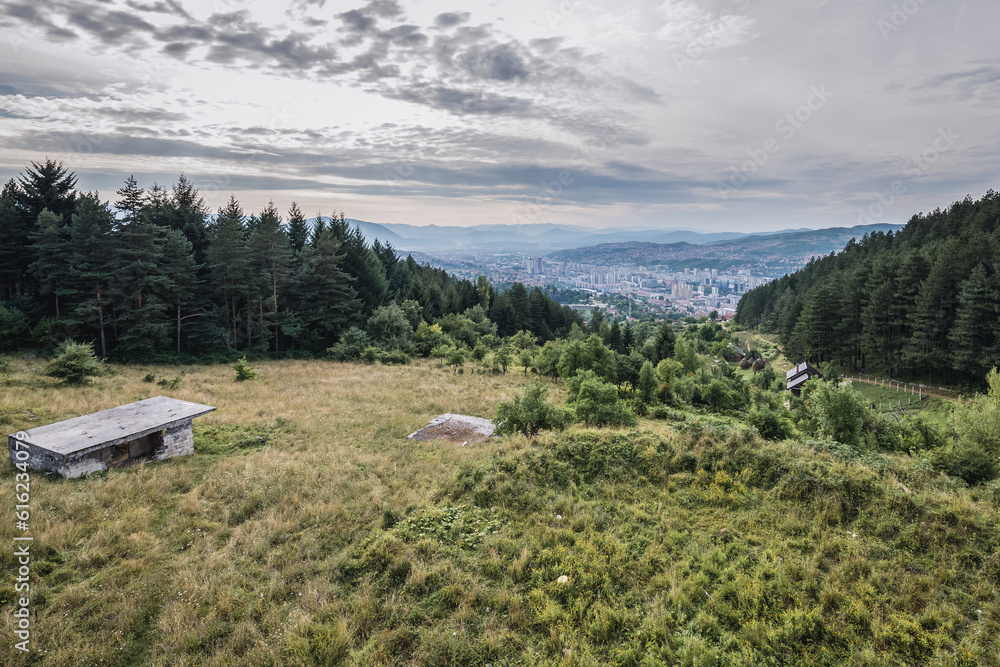Aerial view from damaged and abandoned house on the slope of Trebevic ...